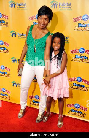 Actress Angela Bassett and her daughter Bronwin pose with Alana Feld ...