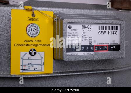 Gas meter in the basement with inspection attachments of the last gas ...
