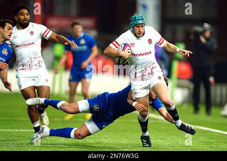 England's Josh Hathaway gets past Italy's Giovanni Sante during the Six ...