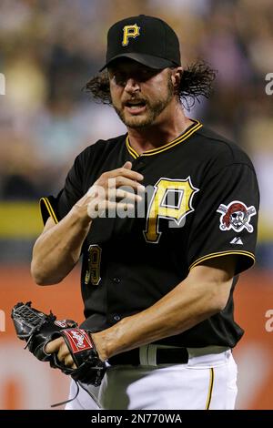 Pittsburgh Pirates closer Jason Grilli hugs first baseman Gaby Sanchez ...