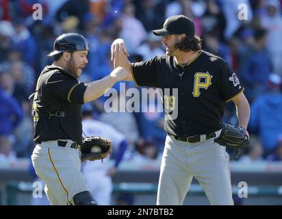 Pittsburgh Pirates closer Jason Grilli hugs first baseman Gaby Sanchez ...