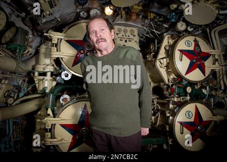 British actor, Stuart McGugan poses for photographs, during the filming ...