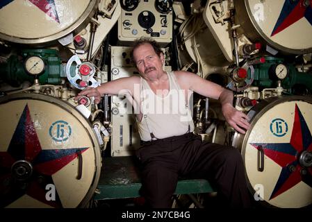 British actor, Stuart McGugan poses for photographs, during the filming ...