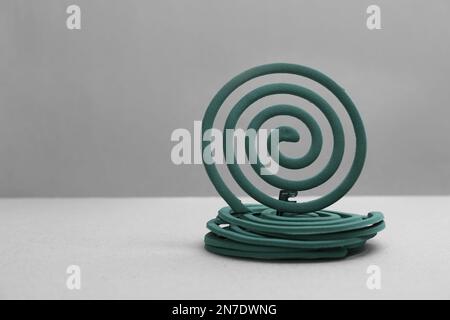 New insect repellent coils on grey background Stock Photo - Alamy