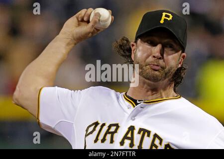 Pittsburgh Pirates closer Jason Grilli hugs first baseman Gaby Sanchez ...