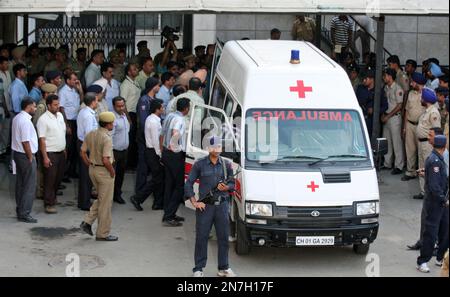 Pakistani prisoner Sanaullah Ranjay is carried on a stretcher to be ...