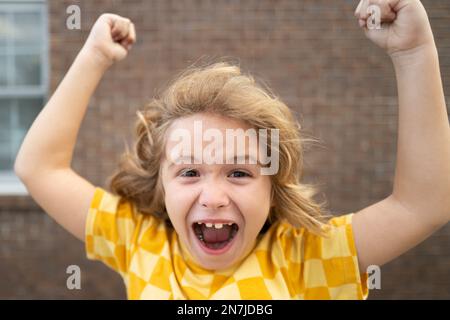 Child with angry expression. Angry hateful little boy, child furious ...