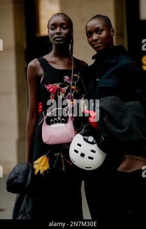 Street style, models Ayuol Manyok and Nyajuok Kueth Chuol after Patou ...