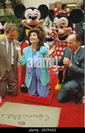 Former Mouseketeer Annette Funicello gets an enthusiastic greeting from ...