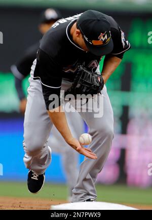 Miami Marlins first baseman Greg Dobbs can't reach a double down the ...