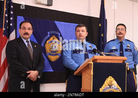 Col. Keith Mallard, center, director of the Alaska State Troopers ...