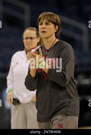 Nebraska head coach Connie Yori grabs a clipboard going into a timeout ...