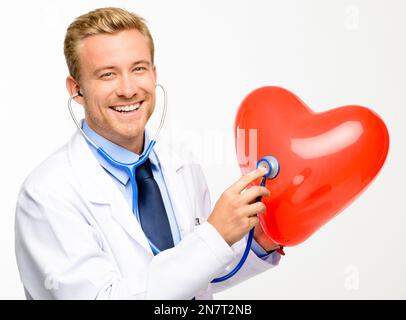 The young handsome doctor cardiologist working in the clinic Stock ...