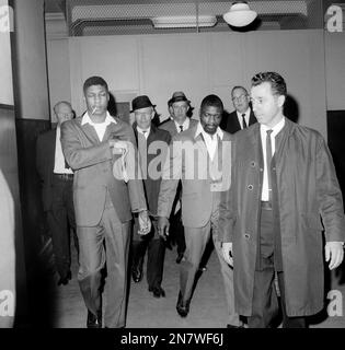 Co-defendants John Artis and Rubin "Hurricane" Carter, bearded man on ...