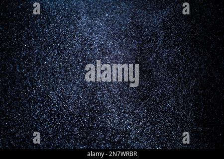dust particles floating on black background, wide photo Stock Photo - Alamy