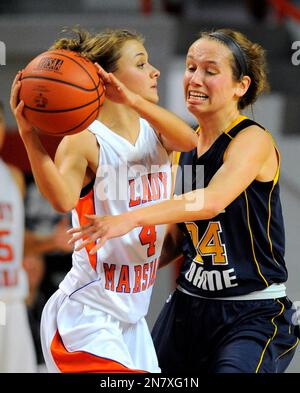 Notre Dame's Carlee Clemons, left,and Madison Central's Ashton Feldhaus ...