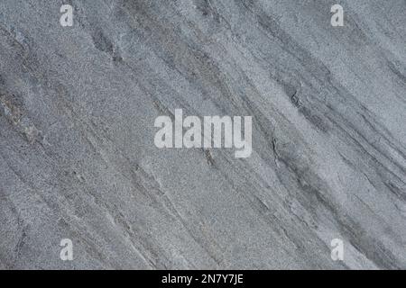 Samples of gray stone with a wavy pattern for the interior. Texture of ...