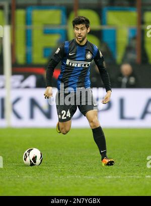 Inter Milan midfielder Marco Benassi, left, challenges for the ball ...