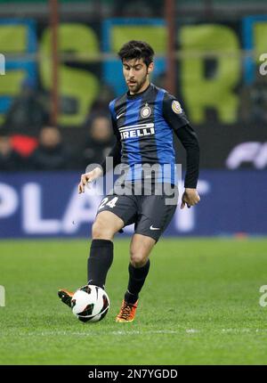 Inter Milan midfielder Marco Benassi, left, challenges for the ball ...