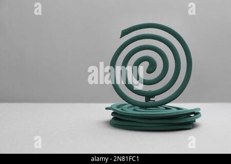 New insect repellent coils on grey background Space for text Stock ...