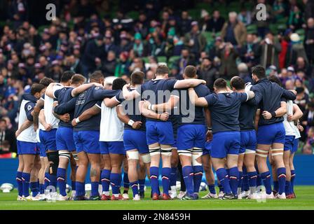 France players huddle ahead of the Guinness Men's Six Nations match the ...