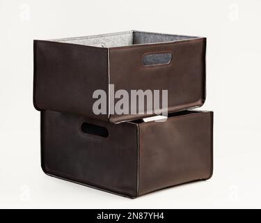 Functional stylish brown faux leather box for storage Stock Photo - Alamy