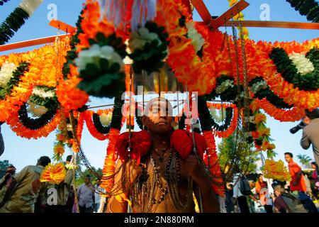 A devotee from a kavadi festival celebrated at lord murugan temple ...