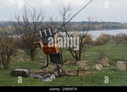 Countryside. Electrical transformer damaged by shelling. War in Ukraine ...