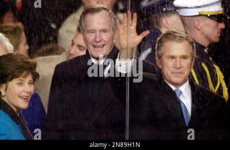 President Bush Watches the Inaugural Parade from the Reviewing Stand ...