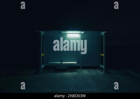 A cinematic shot of an empty bus stop at night with a light on Stock ...