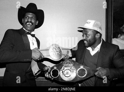 Boxers Michael Spinks, left, and Dwight Braxton, right, pose for the ...