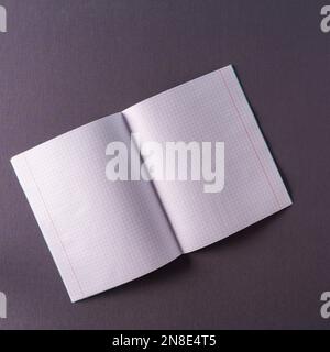 Mockup. An empty A4 notebook in expanded form on wooden background,top ...
