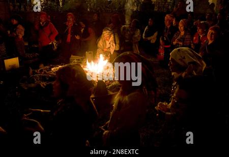 Mayan priests pray during a ceremony to mark the 10th anniversary of ...