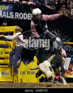 Trey Benton III, of Rock Island, Texas, gets bucked off while competing ...