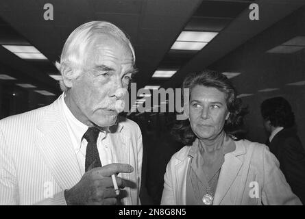 Lee Marvin and his wife Michelle Triola Marvin at the premiere of ...