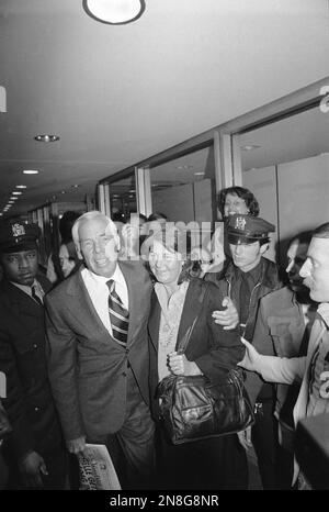 Lee Marvin and his wife Michelle Triola Marvin at the premiere of ...