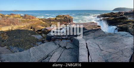 Famous Thunder Hole rocky shoreline of Acadia National park on the ...