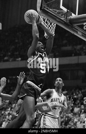 Villanova's Ed Pinckney (54) goes up against Maryland's Len Bias (34 ...