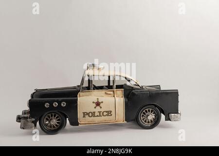 photograph of an old metal police car for decoration vintage iron ...