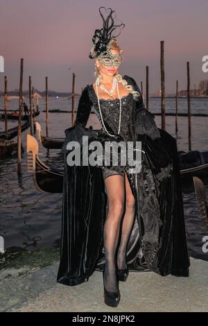 Young participants dressed in vibrant costumes take part in the parade ...