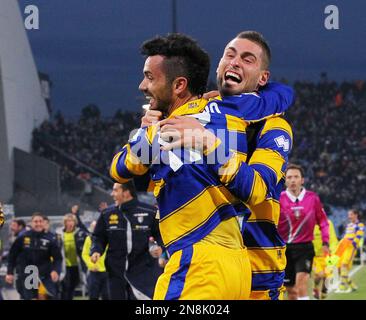 Parma's Raffaele Palladino, left, celebrates after scoring a goal ...