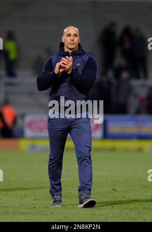 Dino Maamria Manager of Burton Albion applauds the home fans after the ...