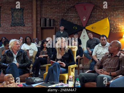 Sir Richard Branson (right) and former gang leader Karl Lokko as they ...