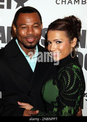 Boxer Sugar Shane Mosley and model Bella Gonzalez attend BET Real ...