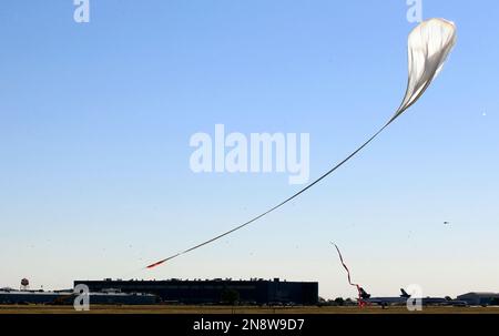 The capsule and attached helium balloon carrying Felix Baumgartner ...