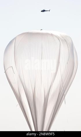 The capsule and attached helium balloon carrying Felix Baumgartner ...
