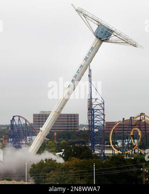 The Texas Chute Out ride falls over as planned during an implosion by ...
