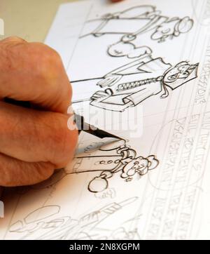 Hy Eisman, 85, works on deadline drawing a Popeye cartoon at his home ...
