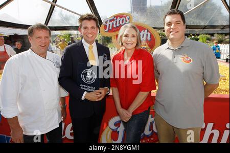 Michael Empric, Guiness Worlds Records Adjudicator, looks on as chef ...