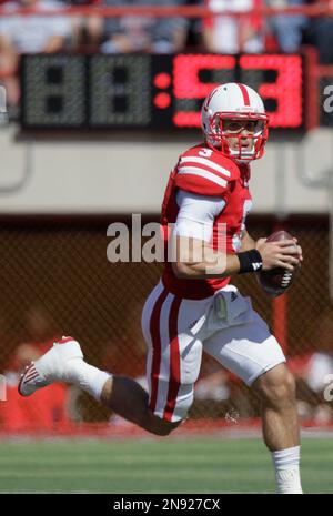 Nebraska quarterback Taylor Martinez carries the ball in the first half ...